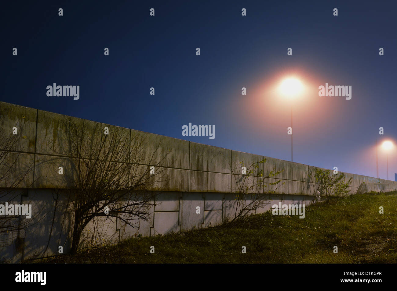 Wall At Night With Lights In Fog Stock Photo - Alamy