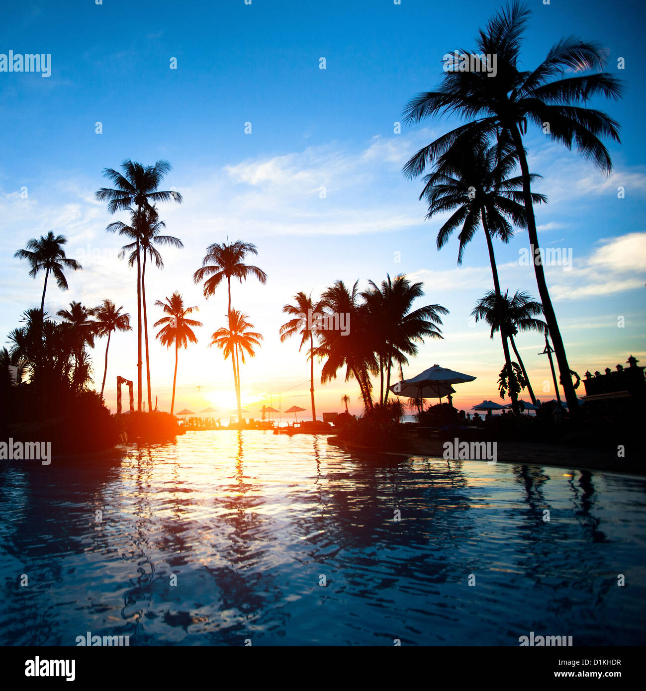 Beautiful sunset at a beach resort in the tropics Stock Photo - Alamy