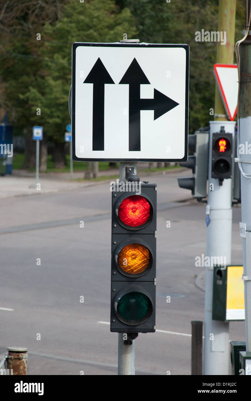 Traffic lights with road signs Stock Photo - Alamy