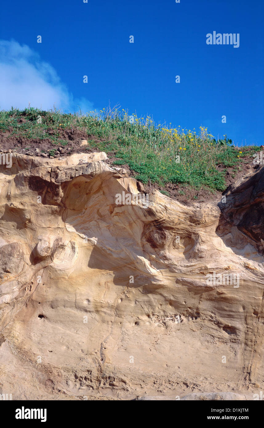 Cliff and blue clear blue sky Stock Photo - Alamy