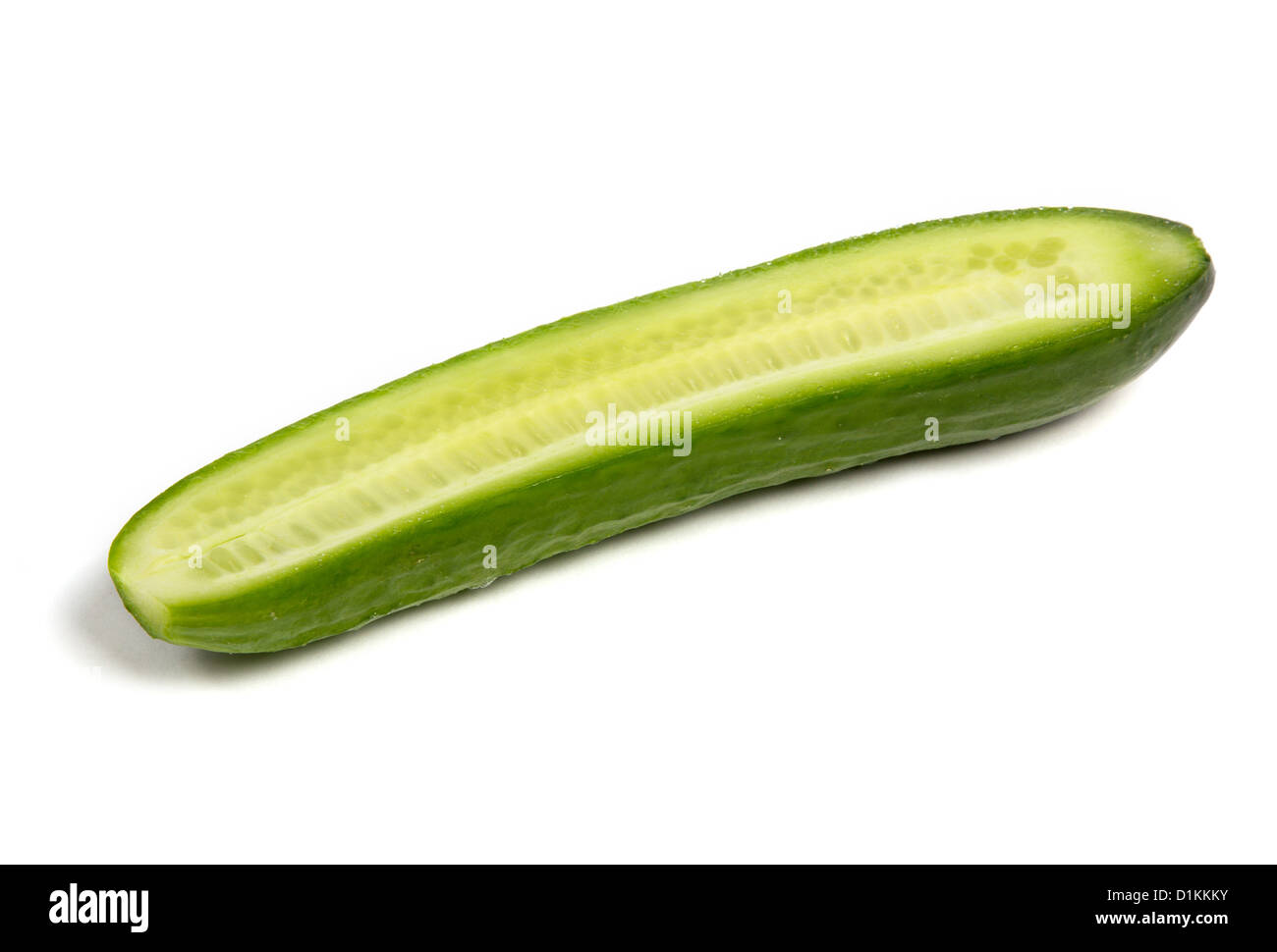 Half cut green vegetable cucumber hi-res stock photography and images ...