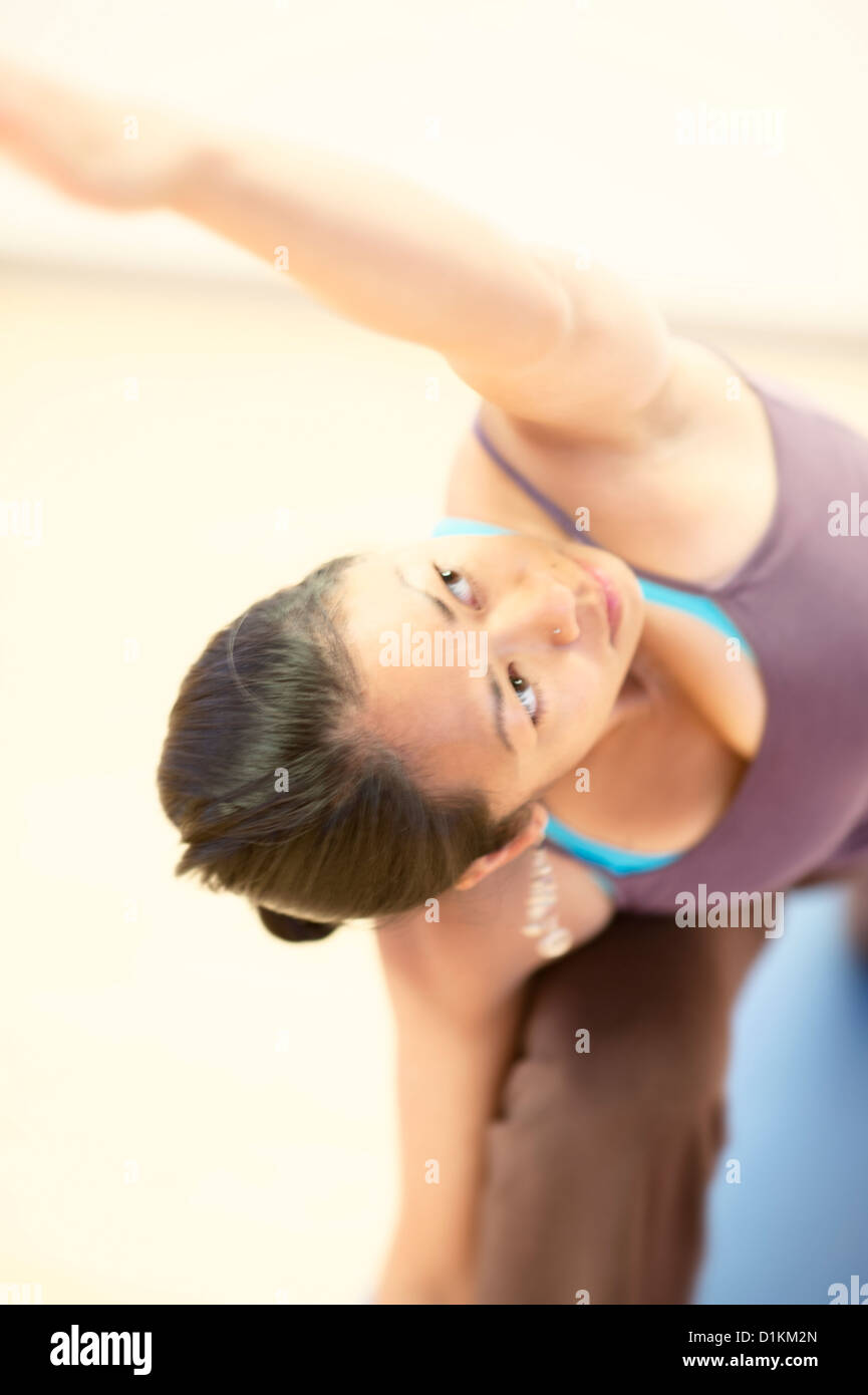 Asian woman practicing yoga Stock Photo - Alamy