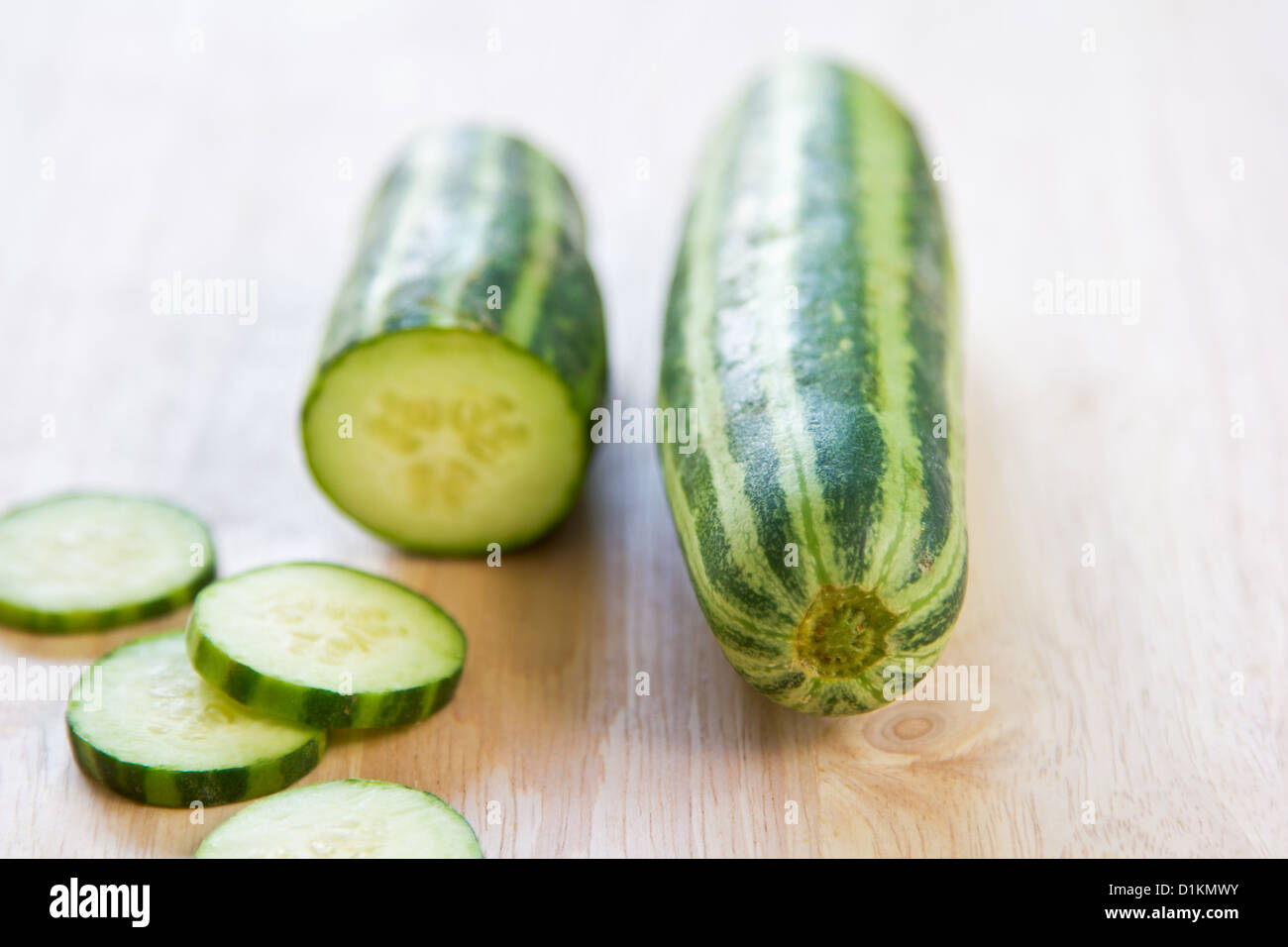 Fresh uncooked green stripe cucumber Stock Photo - Alamy