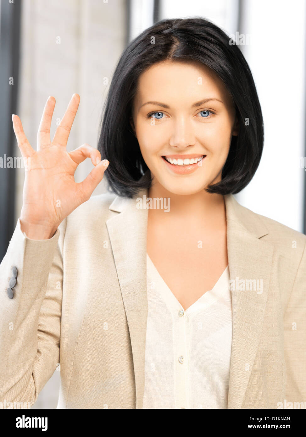 young woman showing ok sign Stock Photo - Alamy