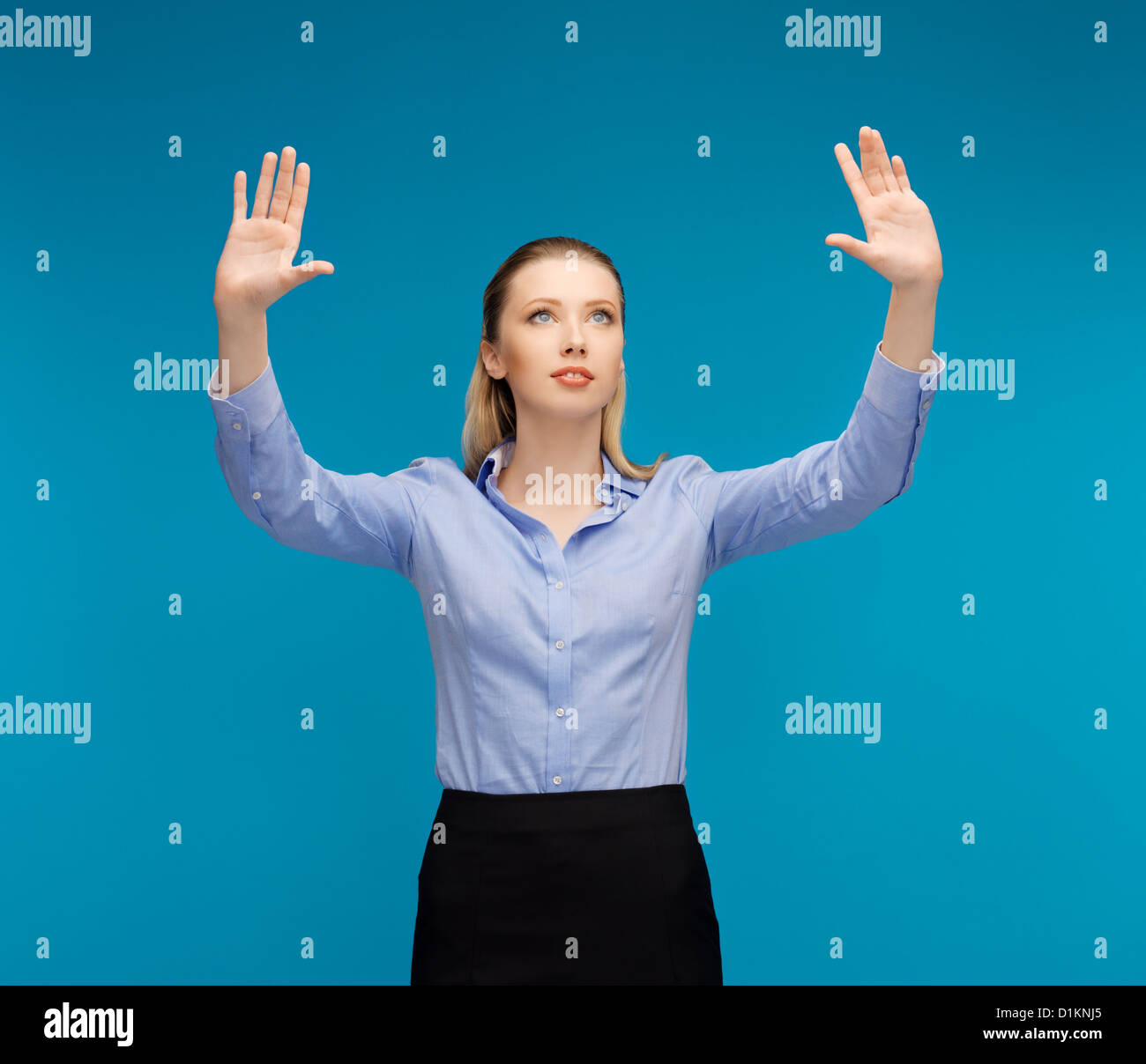 woman working with something imaginary Stock Photo - Alamy