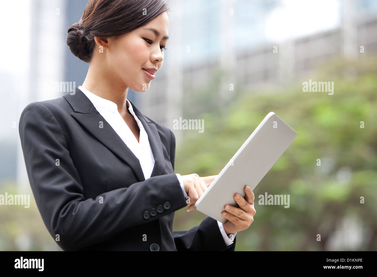 Professional businesswoman with digital tablet, Hong Kong Stock Photo ...