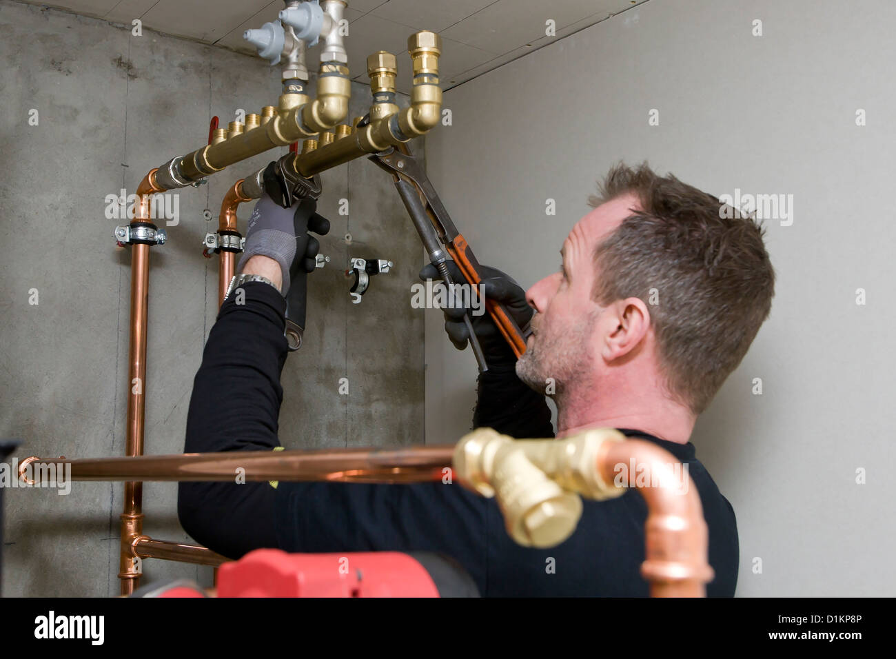Installing pipes hi-res stock photography and images - Alamy