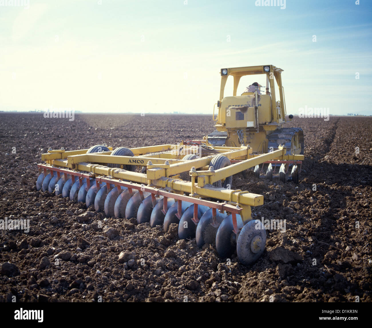CATERPILLAR TRACTOR WITH DISK / CALIFORNIA Stock Photo - Alamy