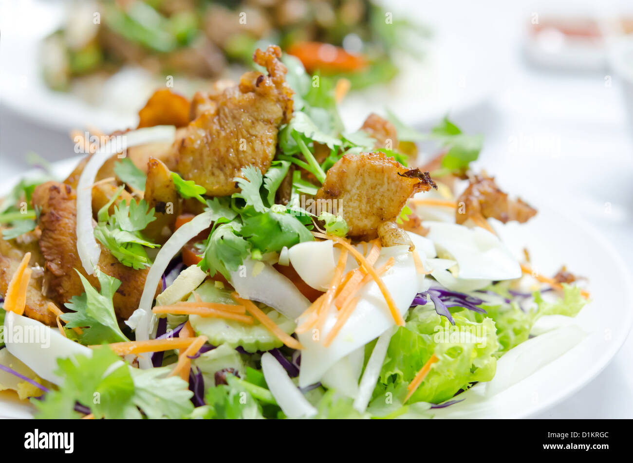 Caesar Salad with fried chicken and fresh vegetable Stock Photo - Alamy