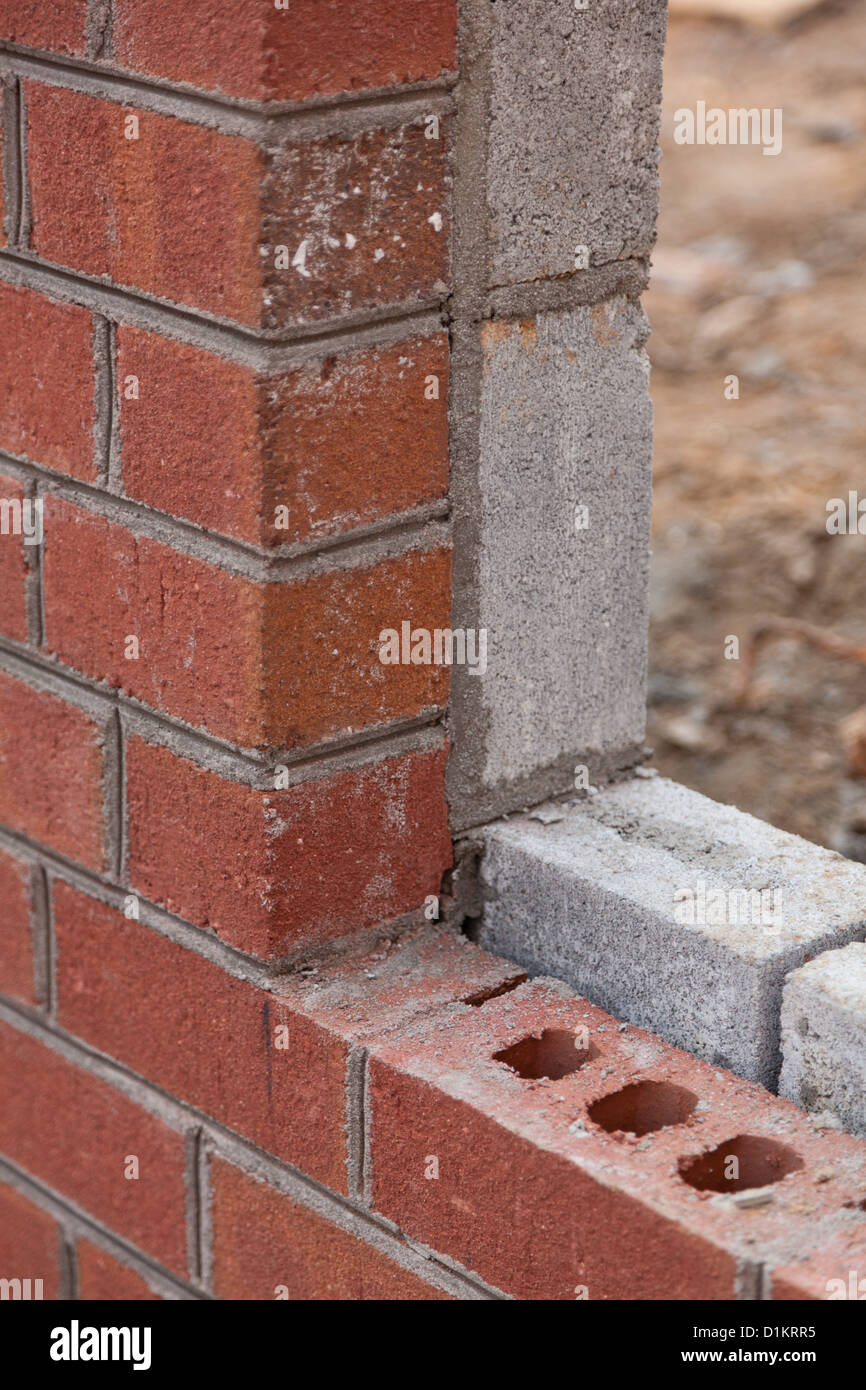 Details on the construction of a brick wall for a new home Stock Photo ...