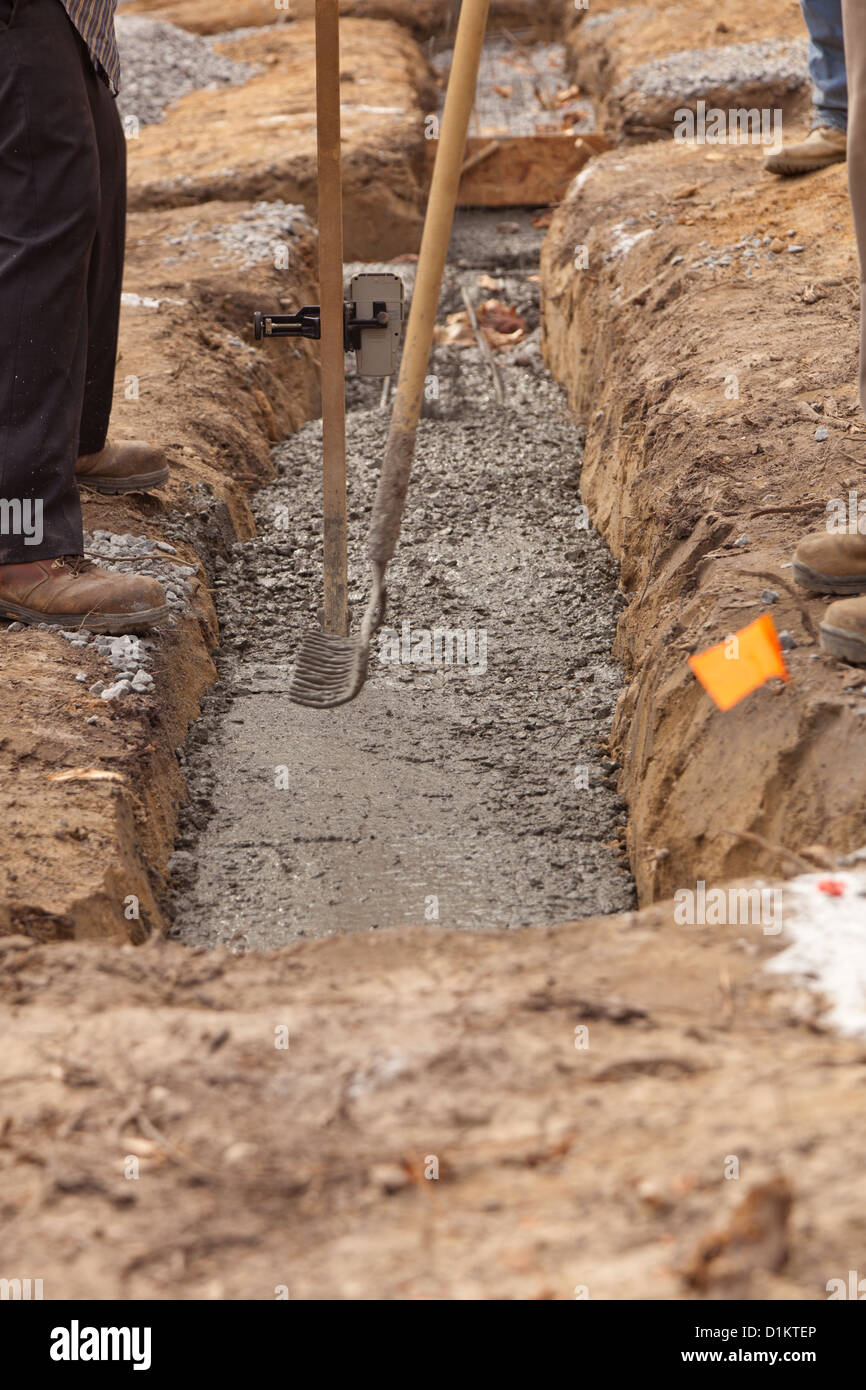 Fresh concrete for a home's footings Stock Photo - Alamy