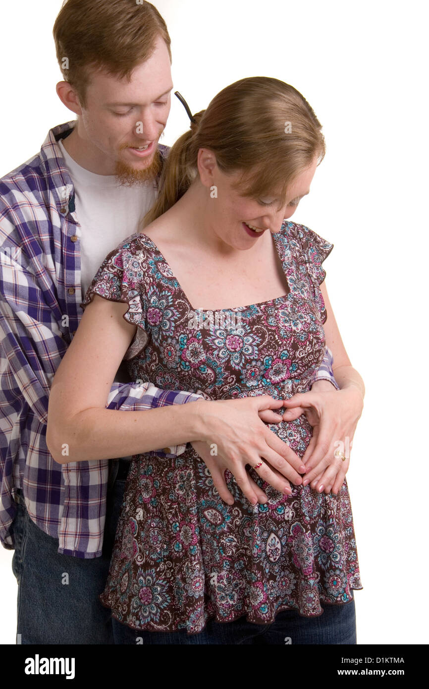 A young couple expecting their first child Stock Photo - Alamy