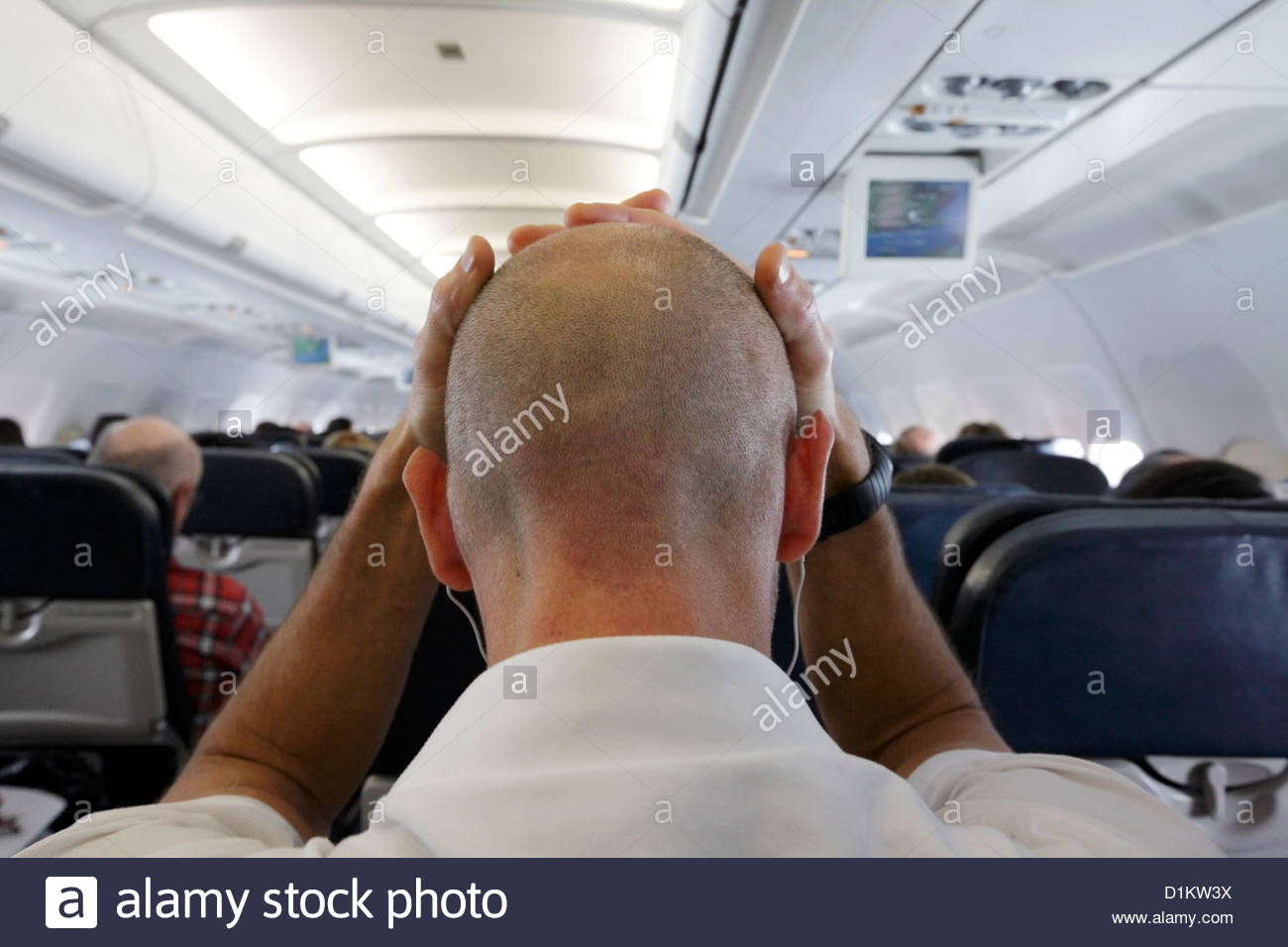 Plane Aisle Passenger Stock Photos & Plane Aisle Passenger Stock Images ...