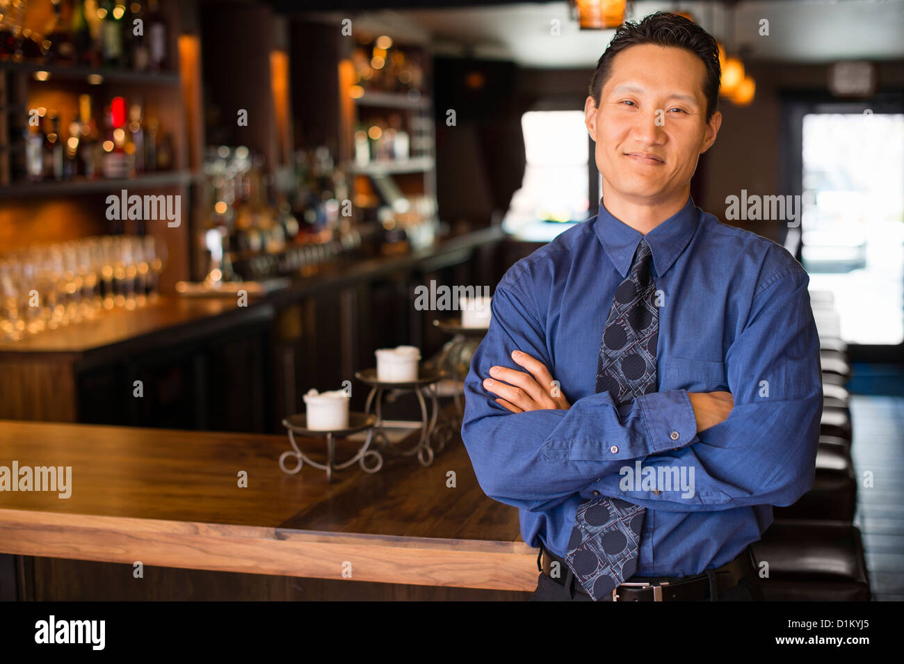 Korean owner in bar Stock Photo - Alamy