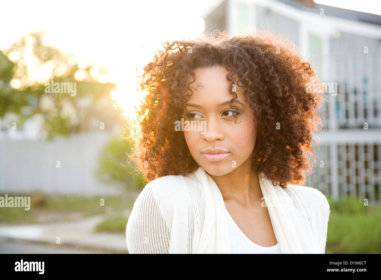 Serious Hispanic woman Stock Photo - Alamy