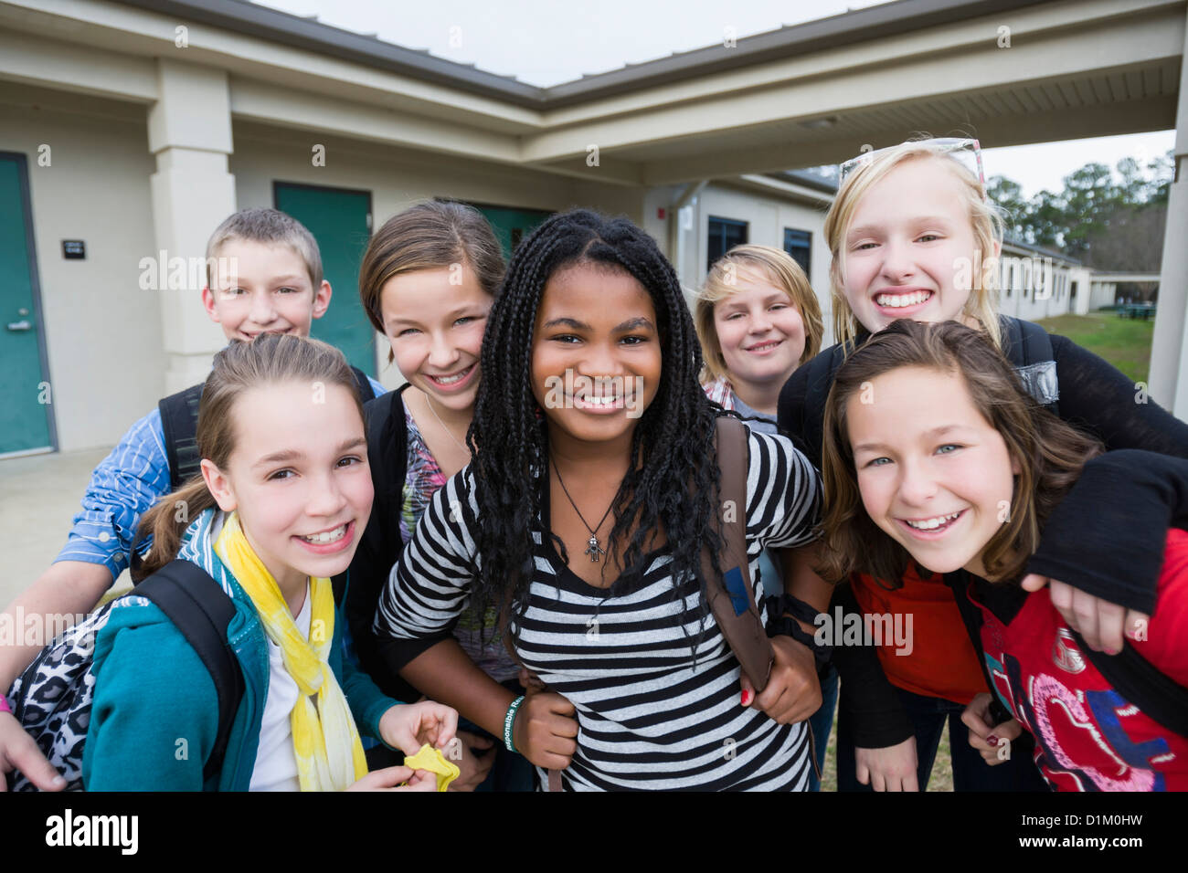 Smiling school friends Stock Photo - Alamy
