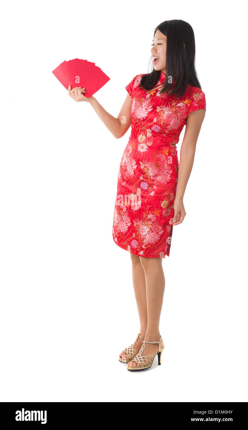 chinese new year girl with ang pow Stock Photo - Alamy