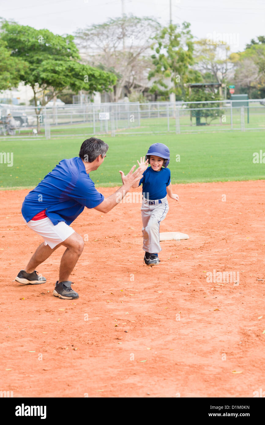 Baseball uniform smiling hispanic hi-res stock photography and images ...