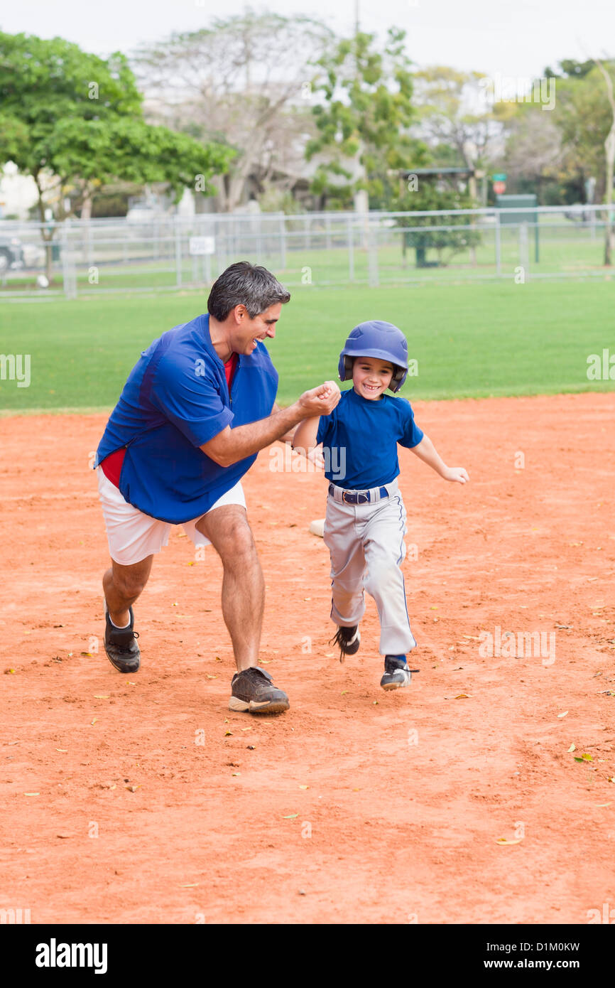 Baseball uniform smiling hispanic hi-res stock photography and images ...