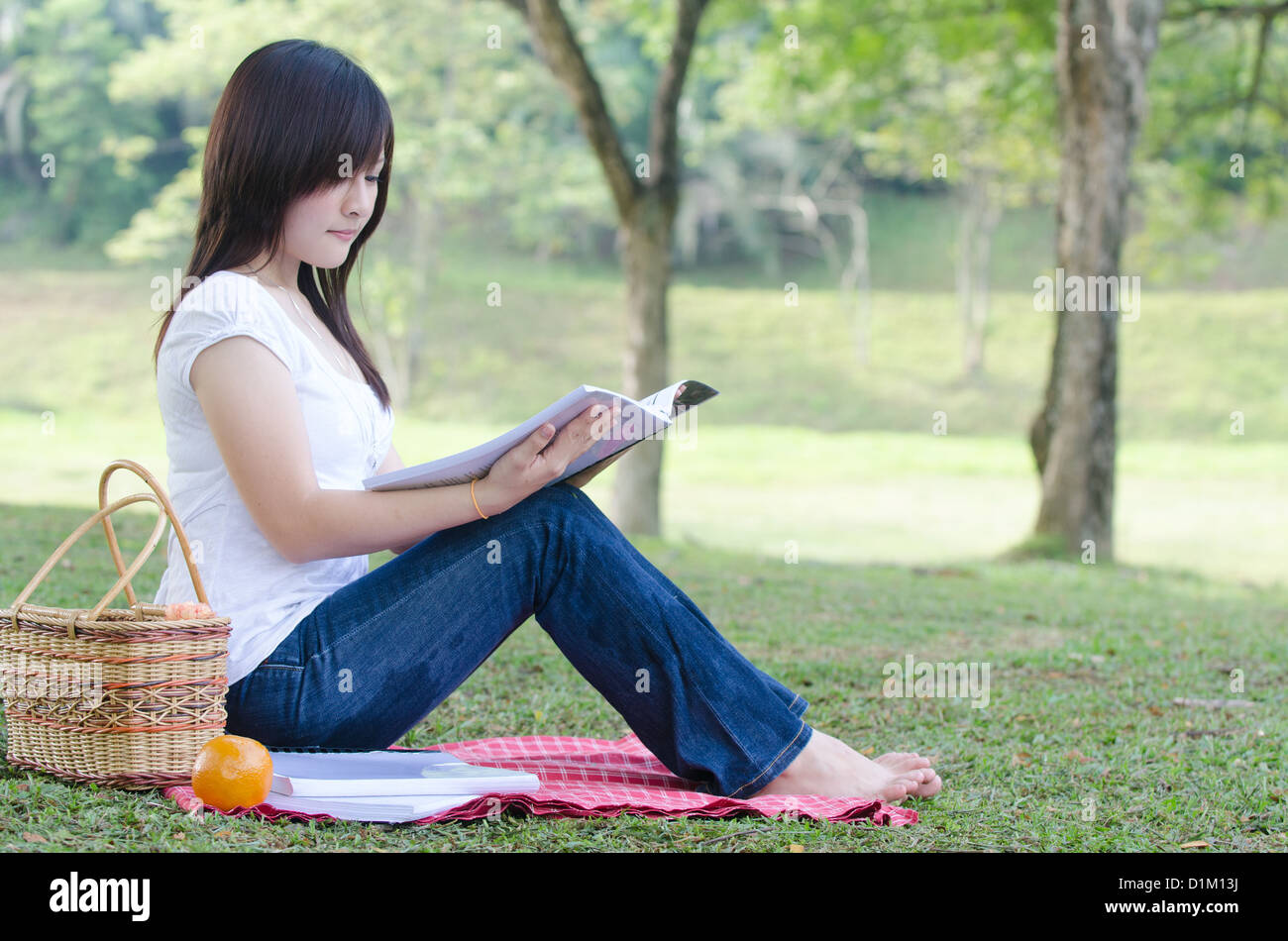 asian college student studying outdoor Stock Photo - Alamy