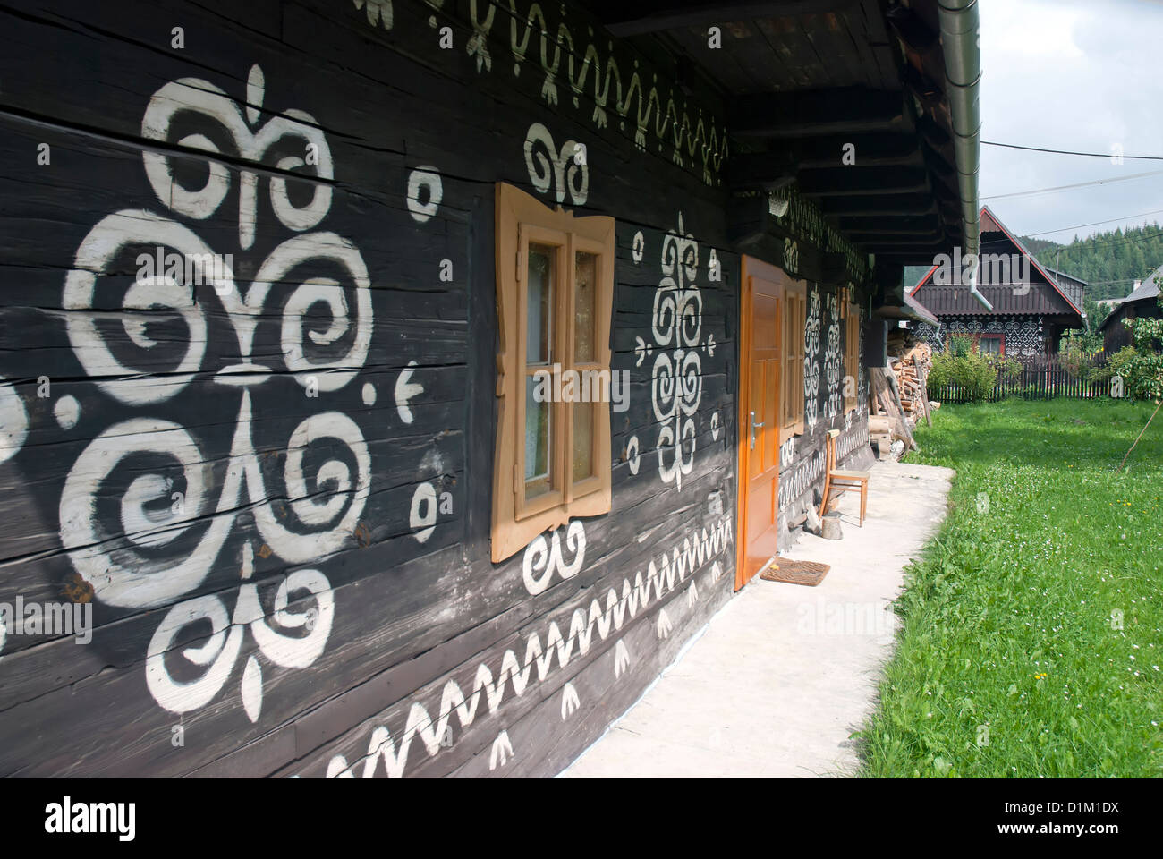 Painted folk cottage in Cicmany village, Slovakia Stock Photo - Alamy