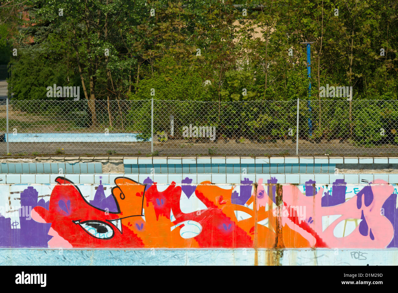 Graffiti in a Pool of a deserted Swimming Bath in Berlin, Germany Stock ...