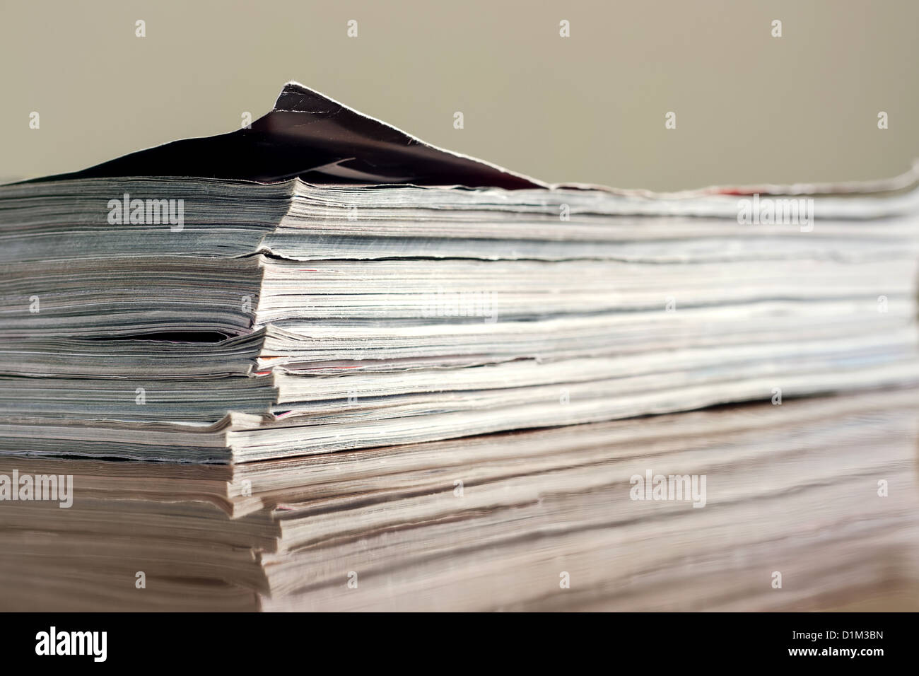 Stack of magazines on wooden table Stock Photo - Alamy