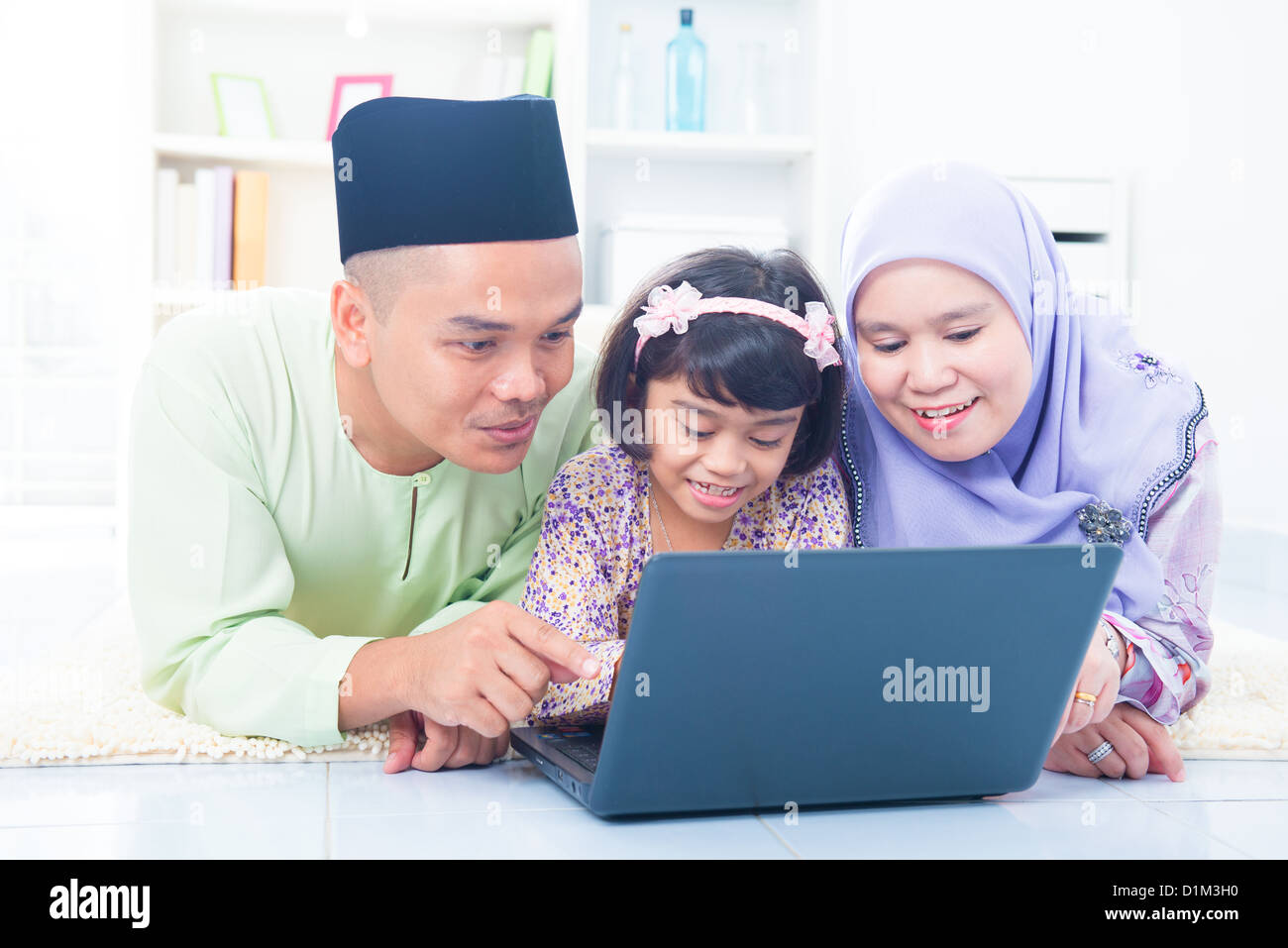 Muslim mother and kid learning hi-res stock photography and images - Alamy