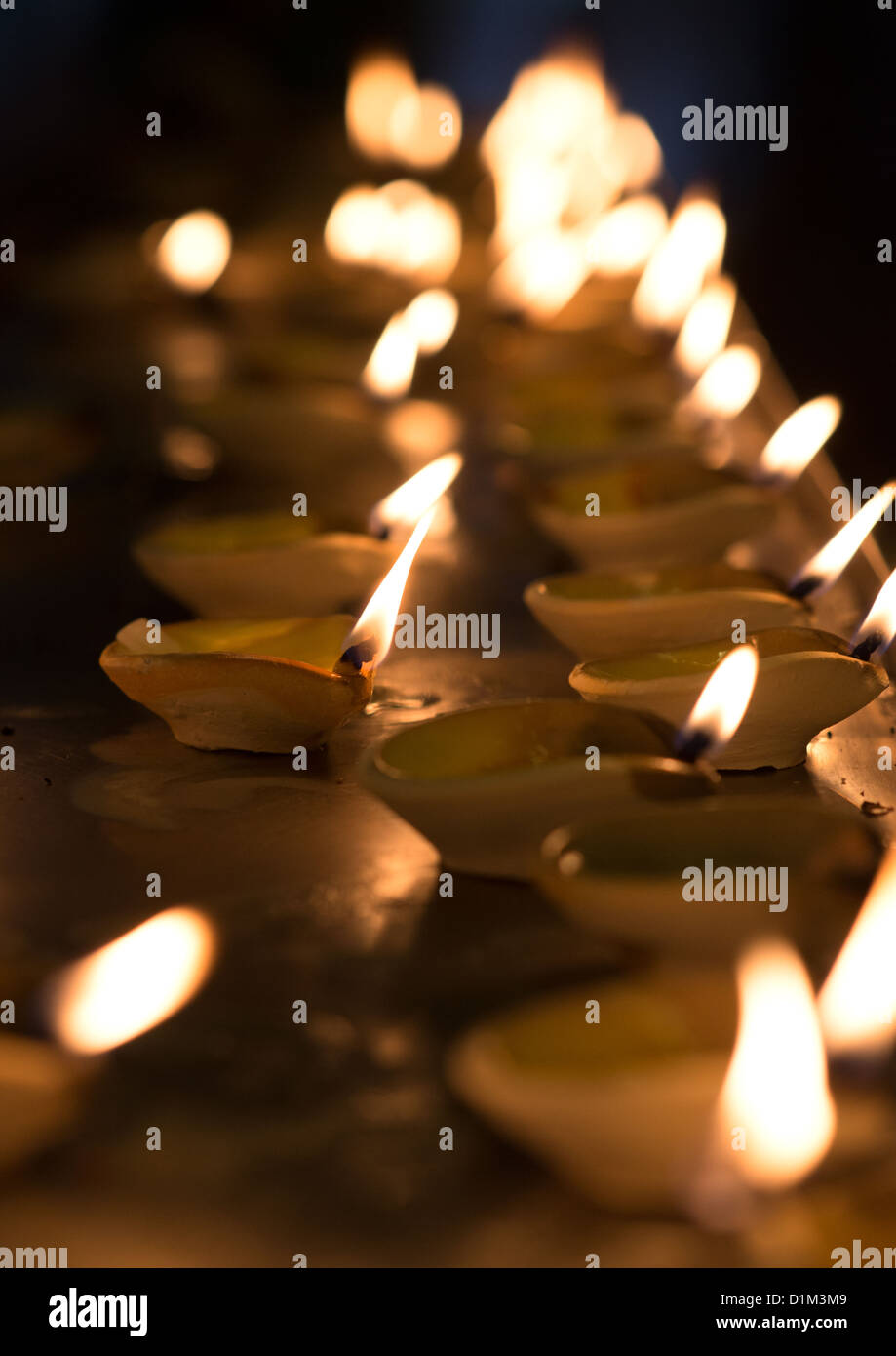 Diwali oil lamp in indian temple Stock Photo - Alamy
