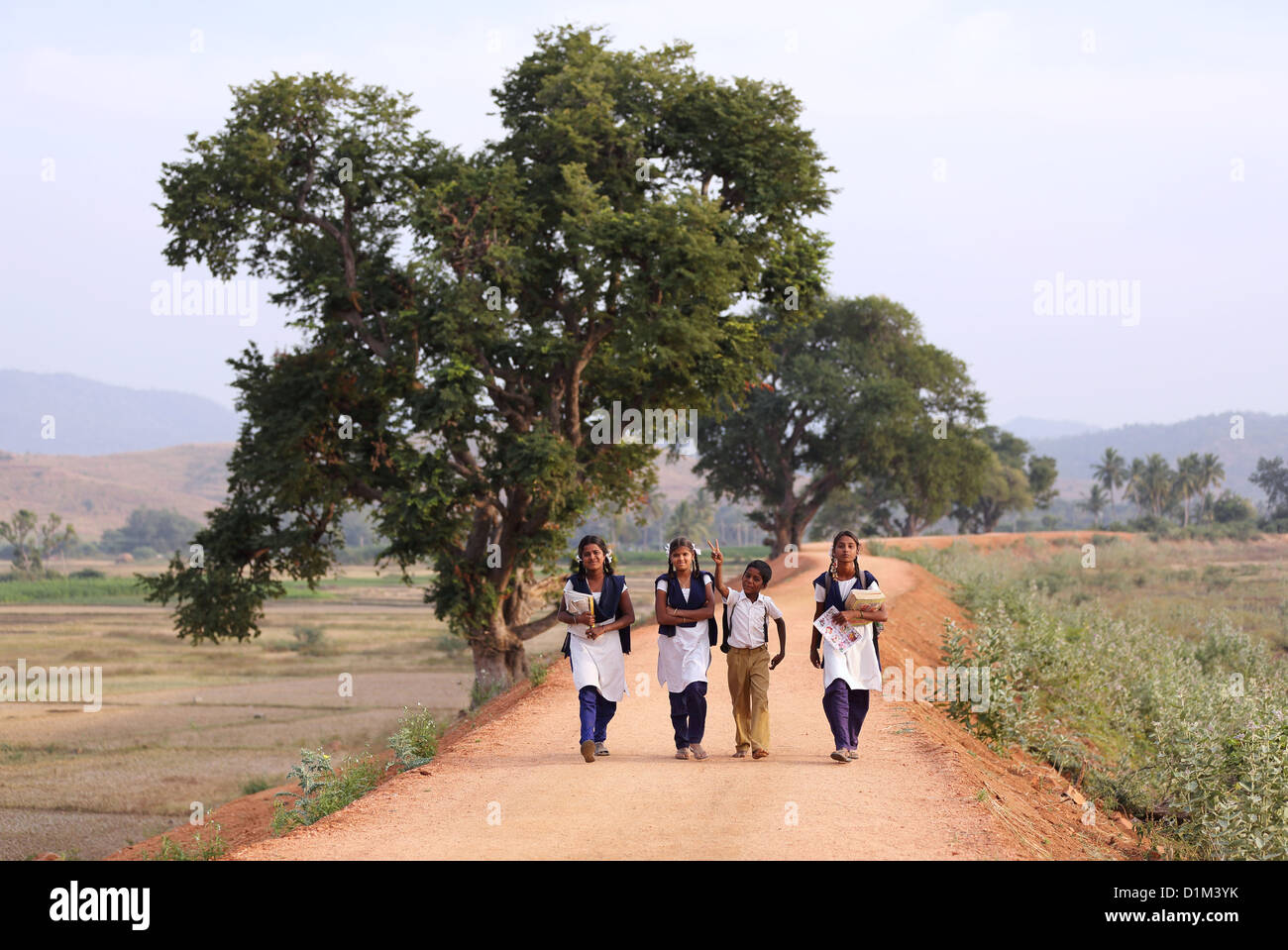 School children walking home hi-res stock photography and images - Alamy