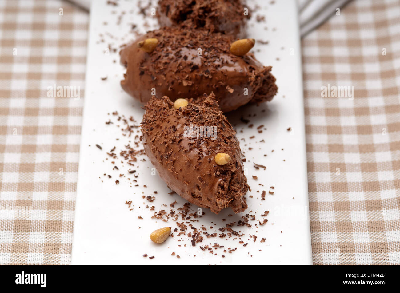 fresh home made chocolate mousse quenelle dessert Stock Photo - Alamy
