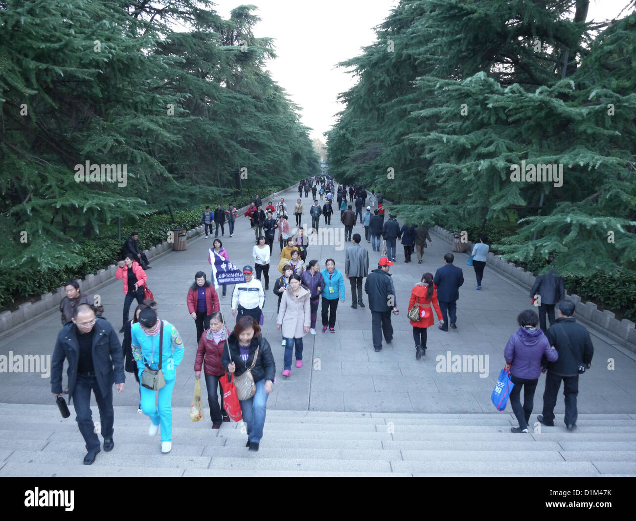 china tour tourists people man woman male female Stock Photo - Alamy