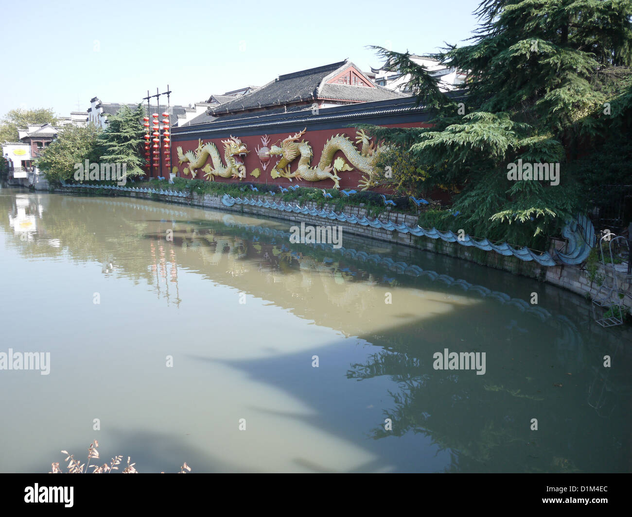 chinese dragon decoration red brick wall river Stock Photo - Alamy