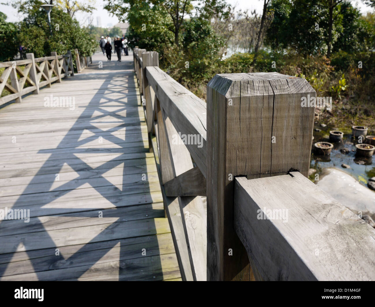 wooden bridge sun cast shadow shape Stock Photo - Alamy