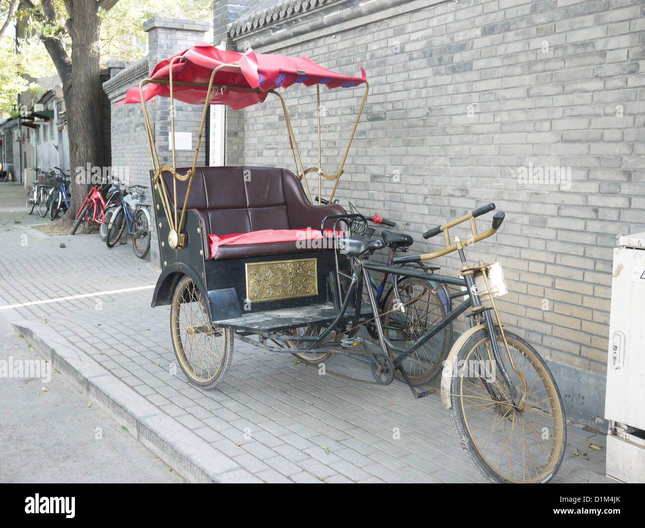 chinese rickshaw pedicab three-wheeler Stock Photo - Alamy