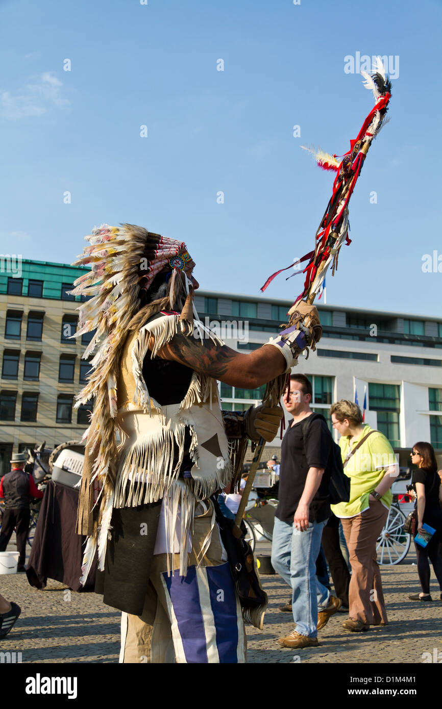 Actors performing as native American Indian at the Brandenburg Gate in ...