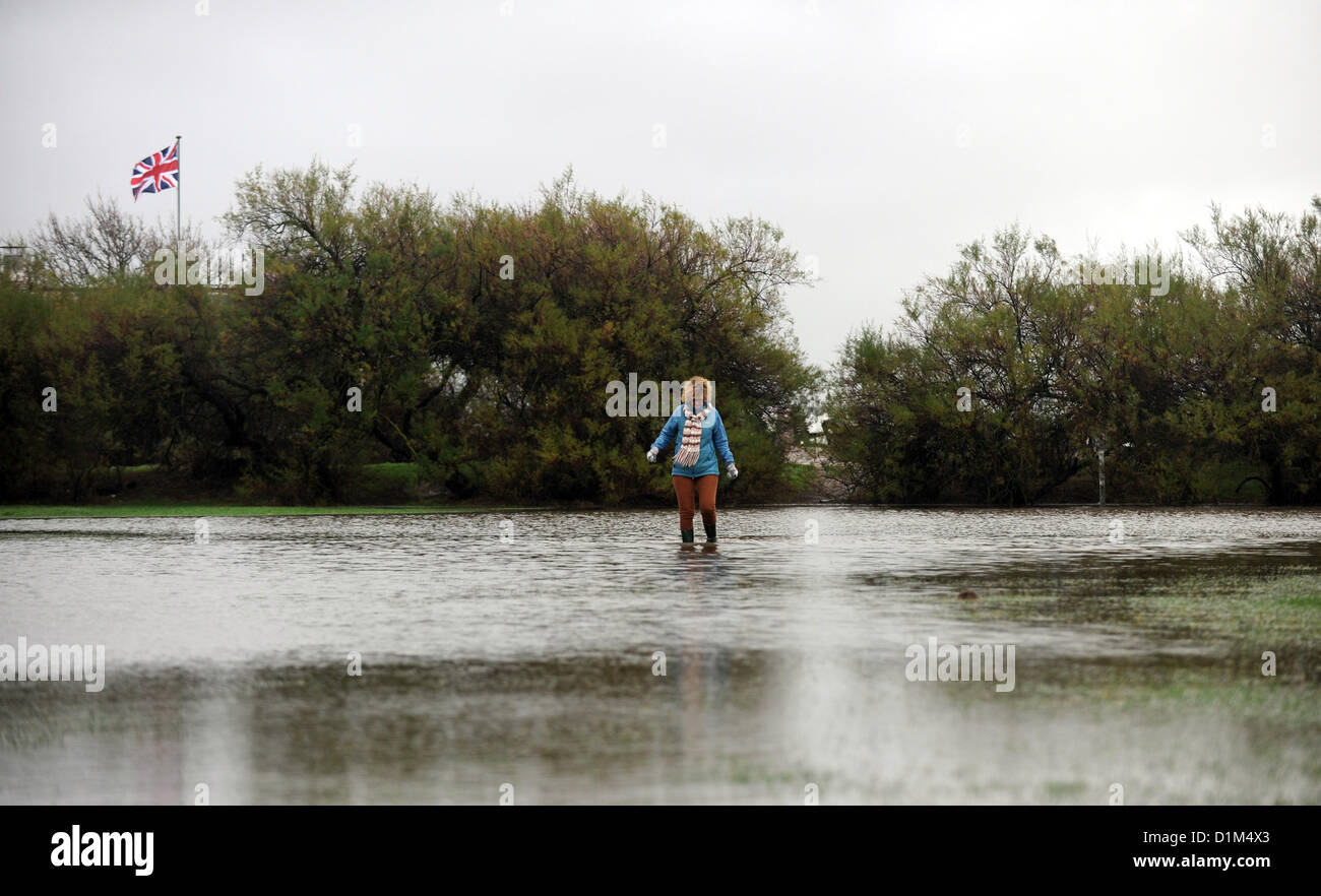 Female walking through flood water hi-res stock photography and images ...