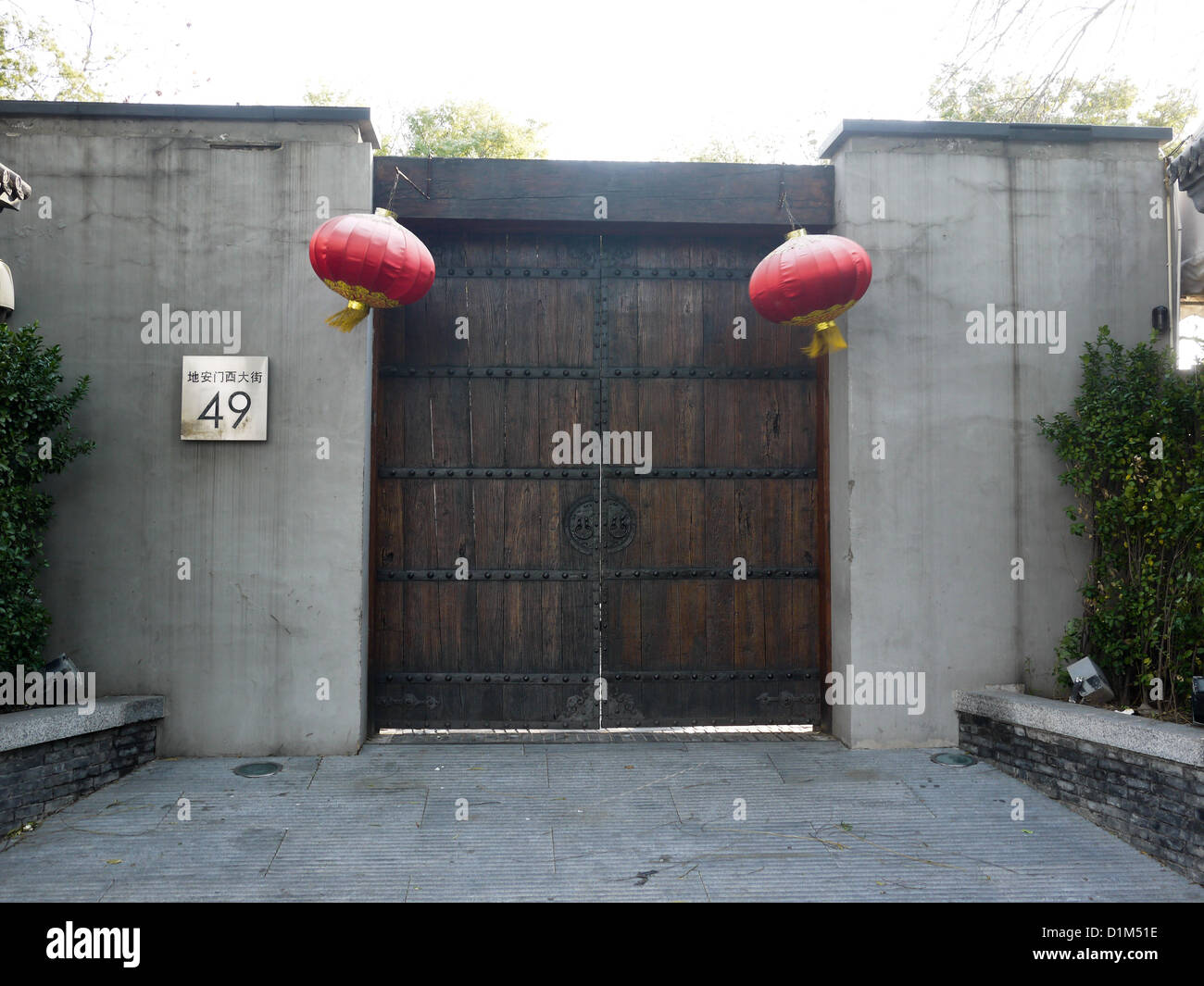 ancient chinese resident home front entrance Stock Photo - Alamy
