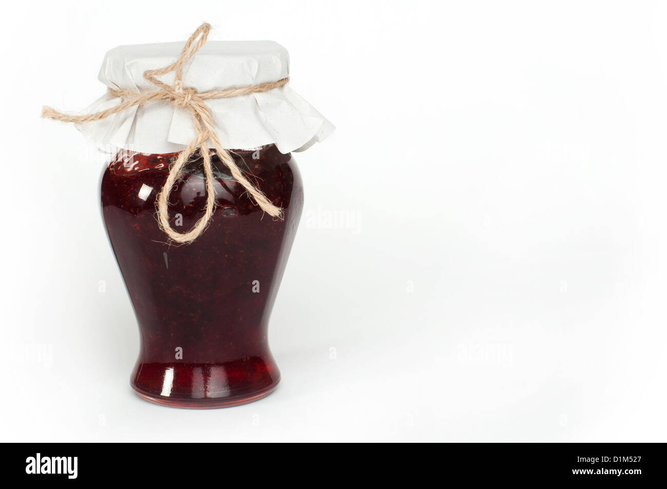 Jar of strawberry jam white isolated Stock Photo - Alamy