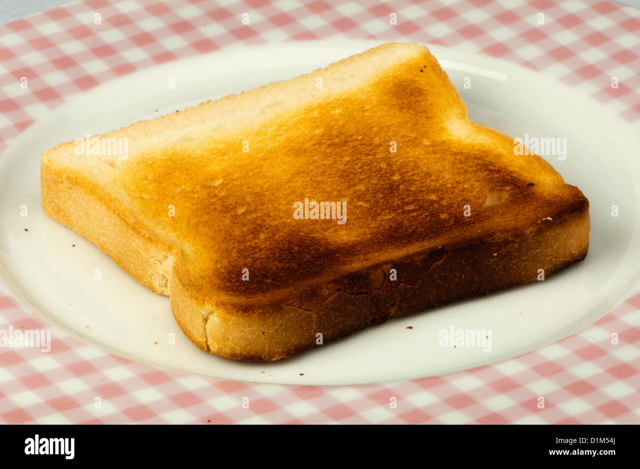 Toasted bread in a pink checkered plate Stock Photo - Alamy