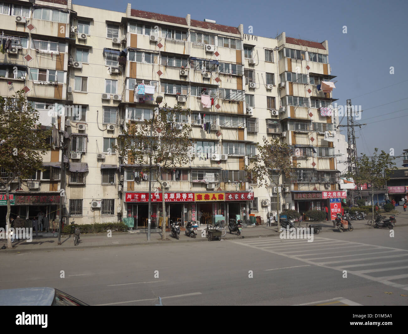 old run down aged apartments china Stock Photo - Alamy