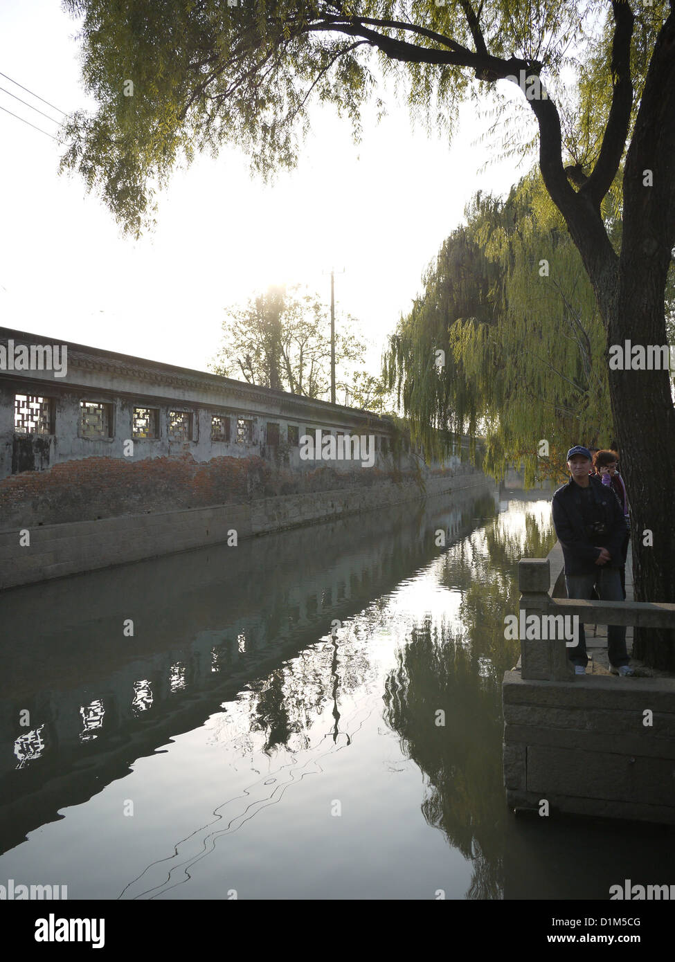 river chinese couple water reflection china Stock Photo - Alamy