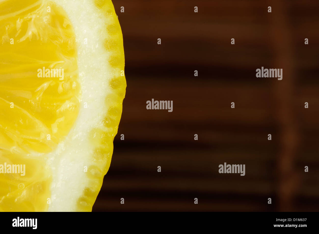 Lemon slice close up Stock Photo - Alamy