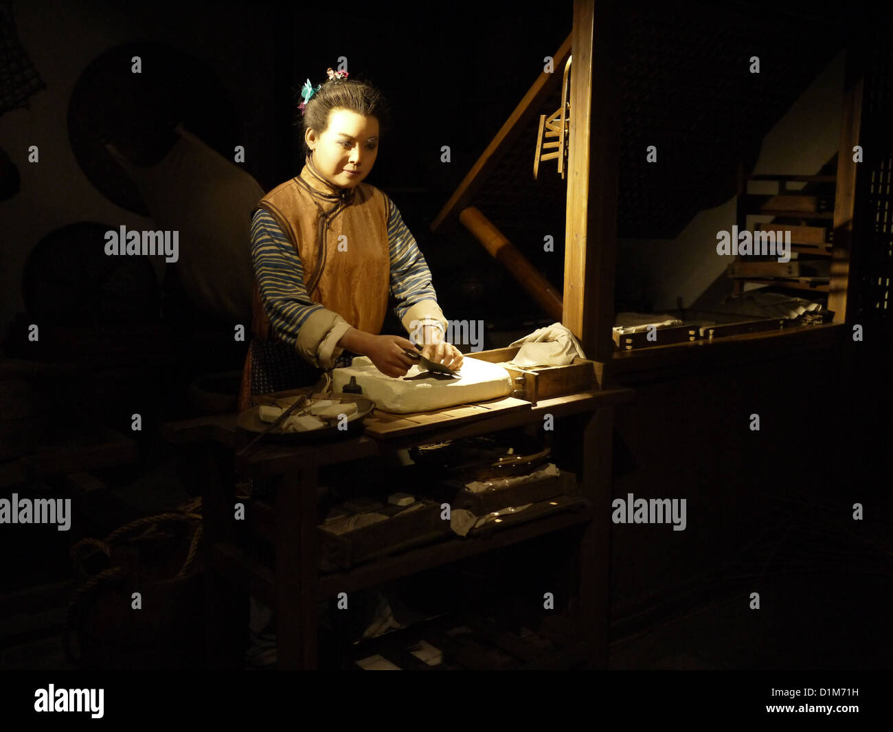 chinese woman sewing wax museum Stock Photo - Alamy