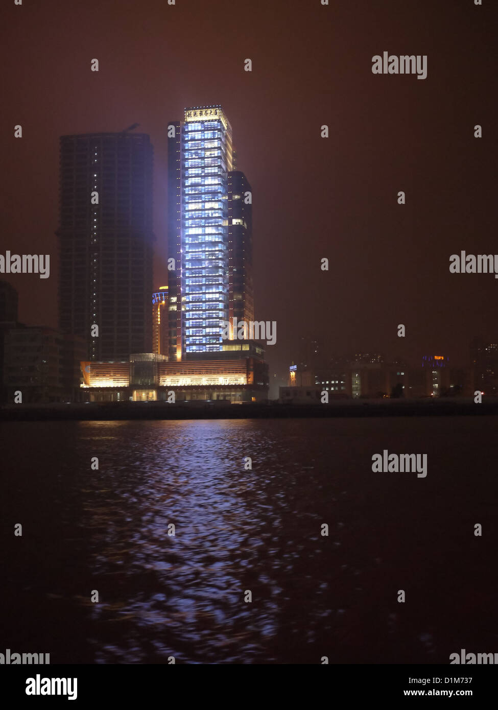 office building reflection river night Stock Photo - Alamy