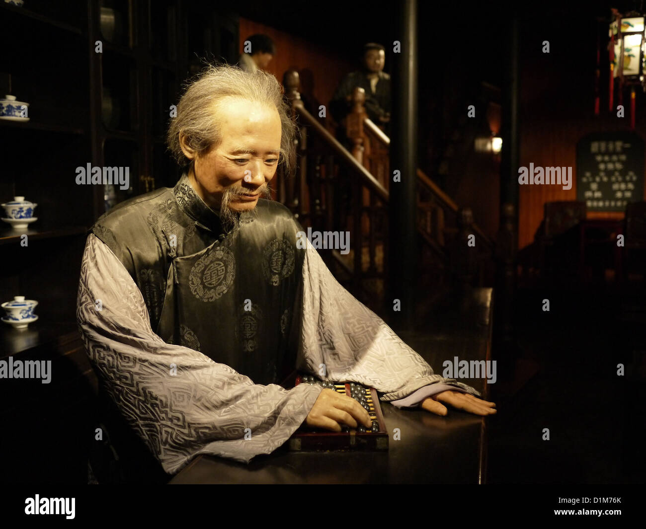 old chinese man gray hair traditional outfit Stock Photo - Alamy