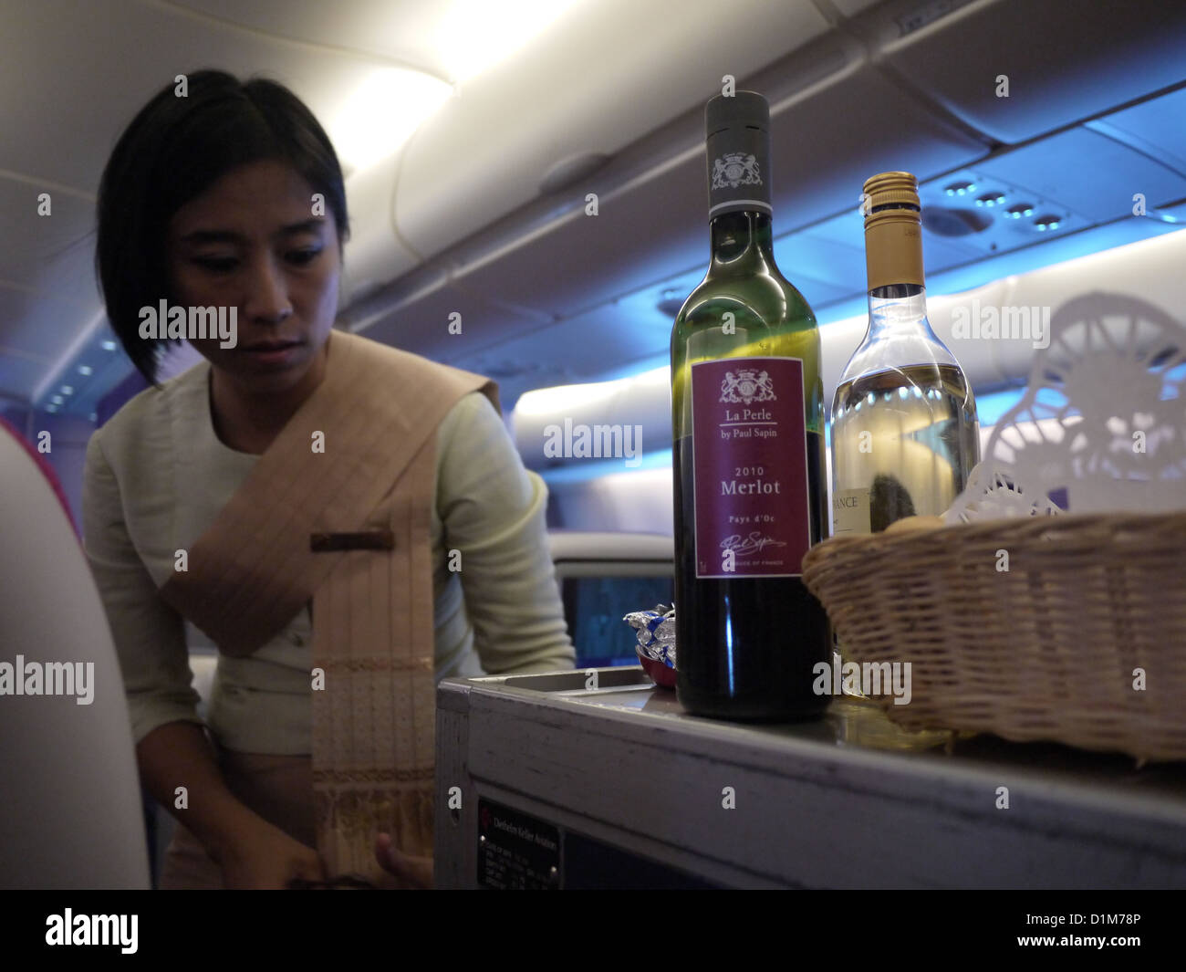 serving wine alcohol airplane cabin in-flight Stock Photo - Alamy