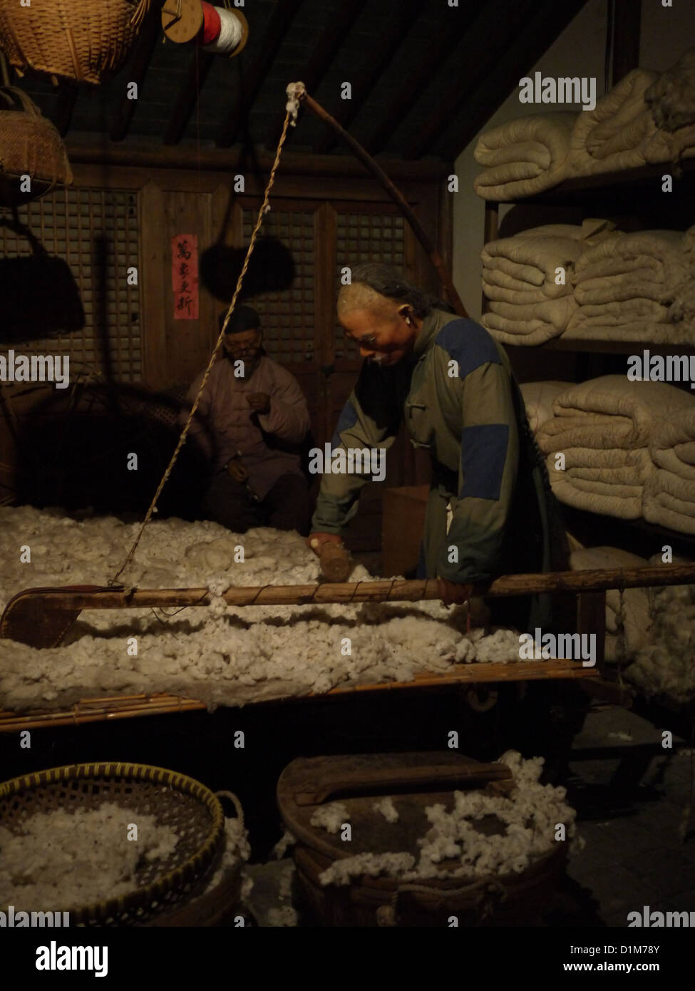 chinese male labor working sheep skin shop Stock Photo - Alamy
