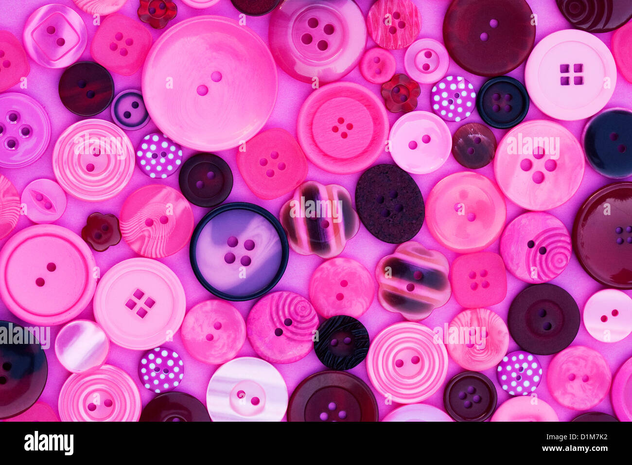 Pink buttons on a pink background Stock Photo - Alamy