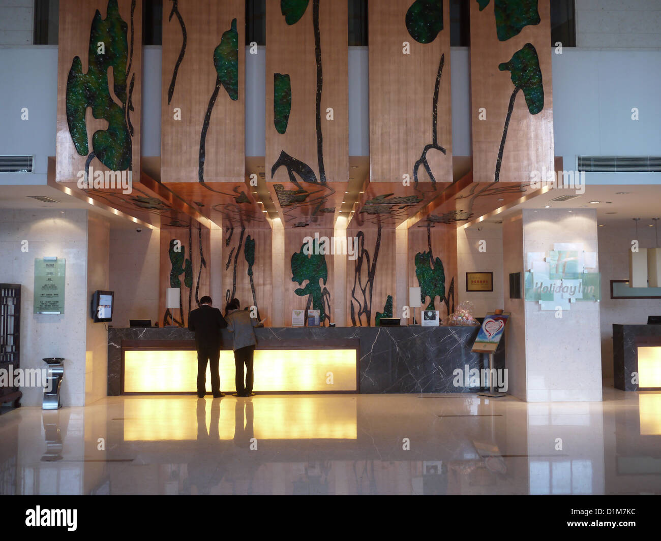 holiday inn checkin counter china Stock Photo - Alamy